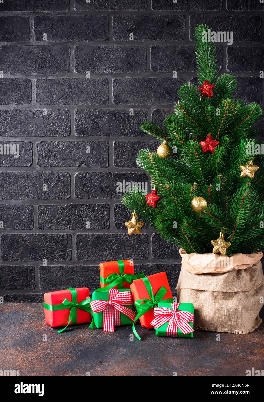 Christmas tree with gift boxes Stock Photo - Alamy