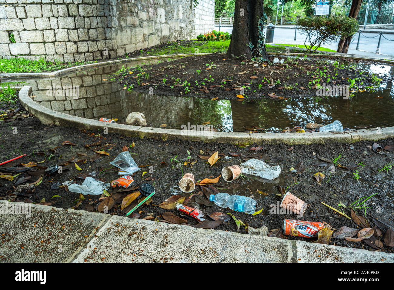 garbage in public garden Stock Photo - Alamy