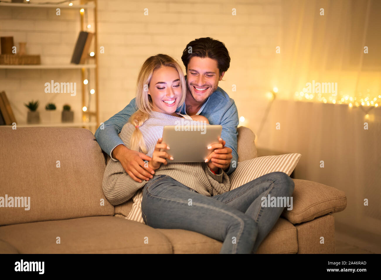 Woman using tablet at night people hi-res stock photography and images ...