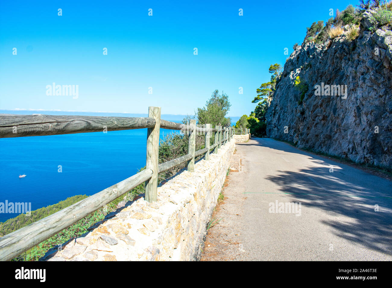 Landscape accompanied by a railing, on top of a stone wall. made of ...