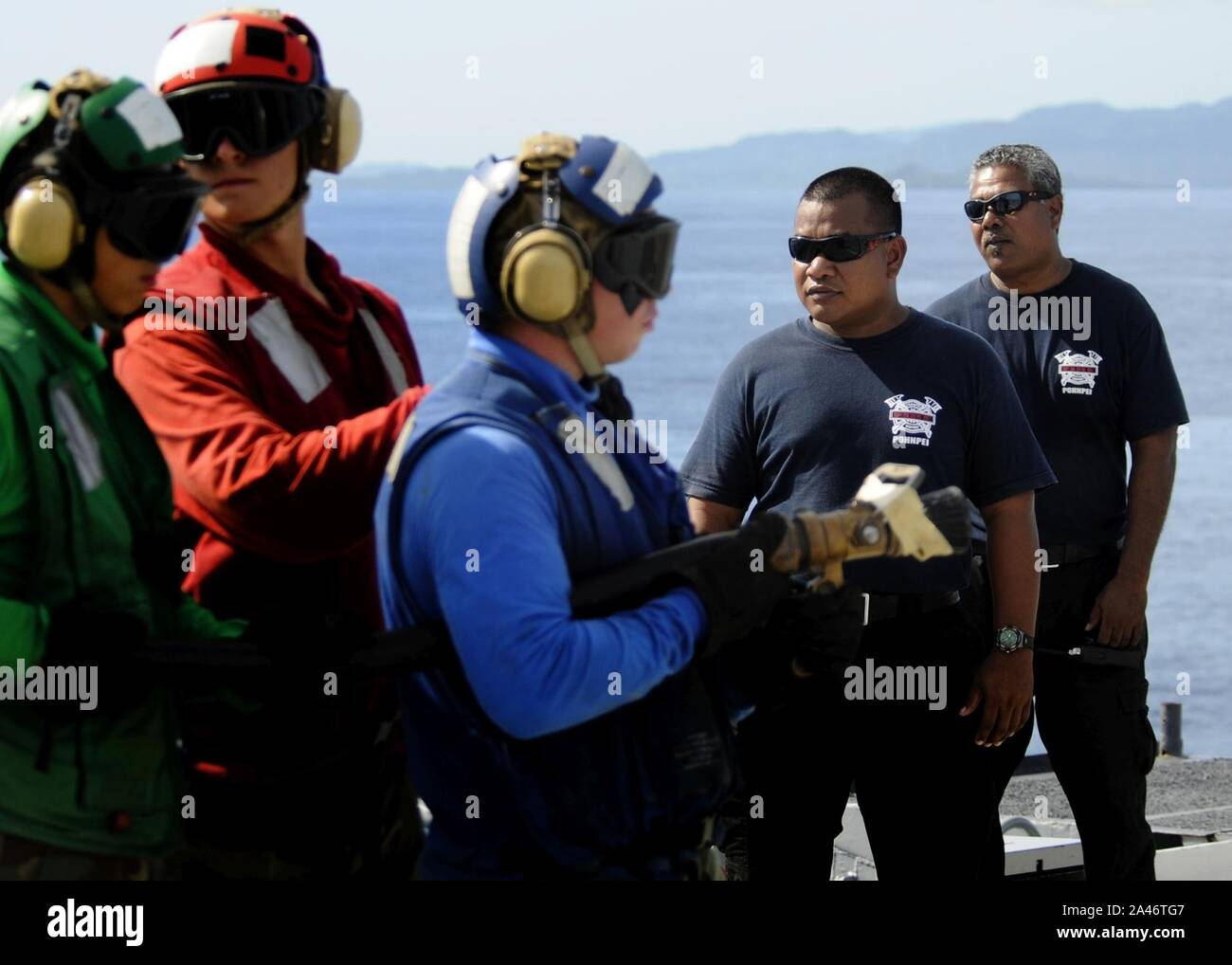 Flight deck firefighting training aboard the USS Cleveland 110706 Stock ...