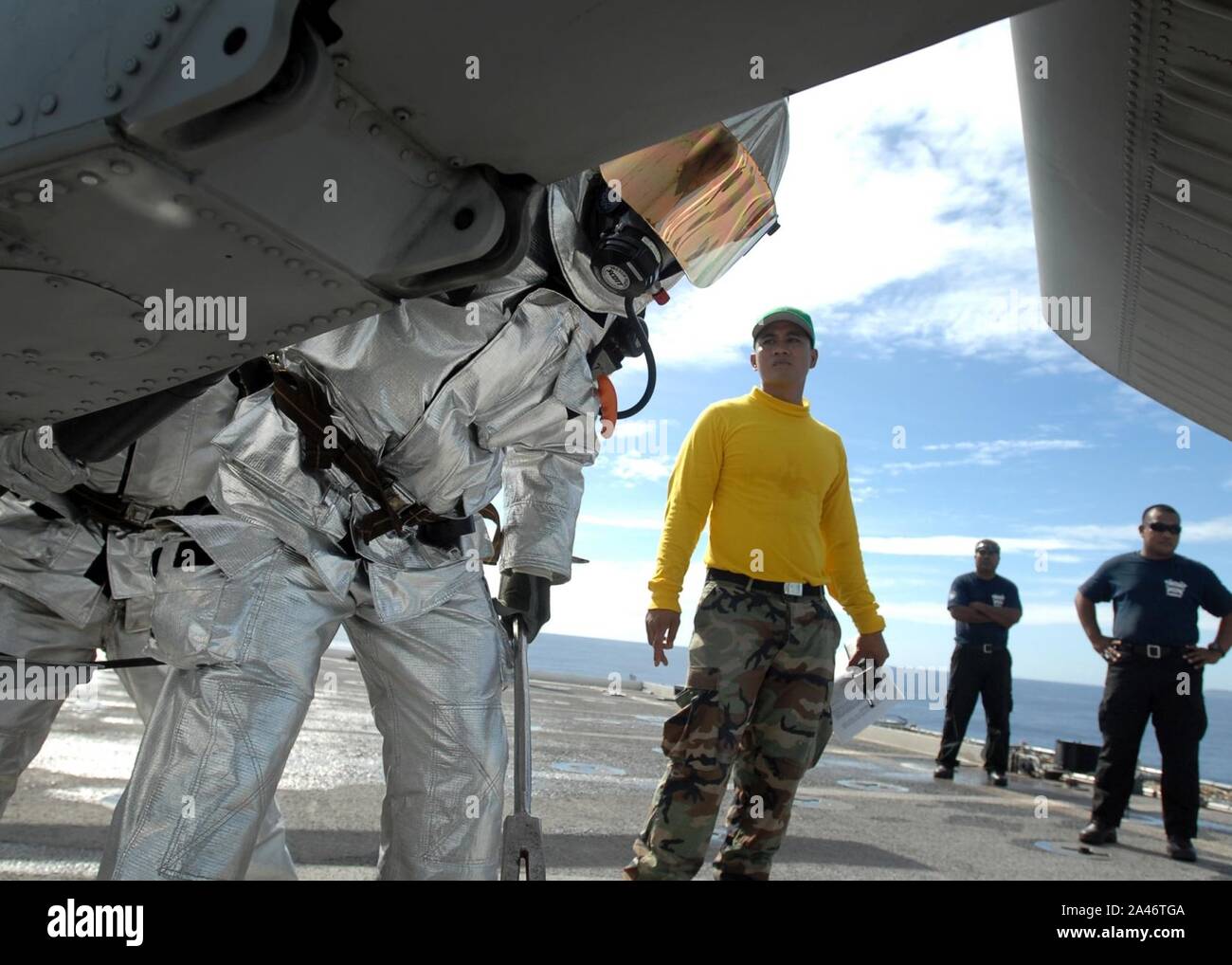 Flight deck firefighting training aboard the USS Cleveland 110706 Stock ...