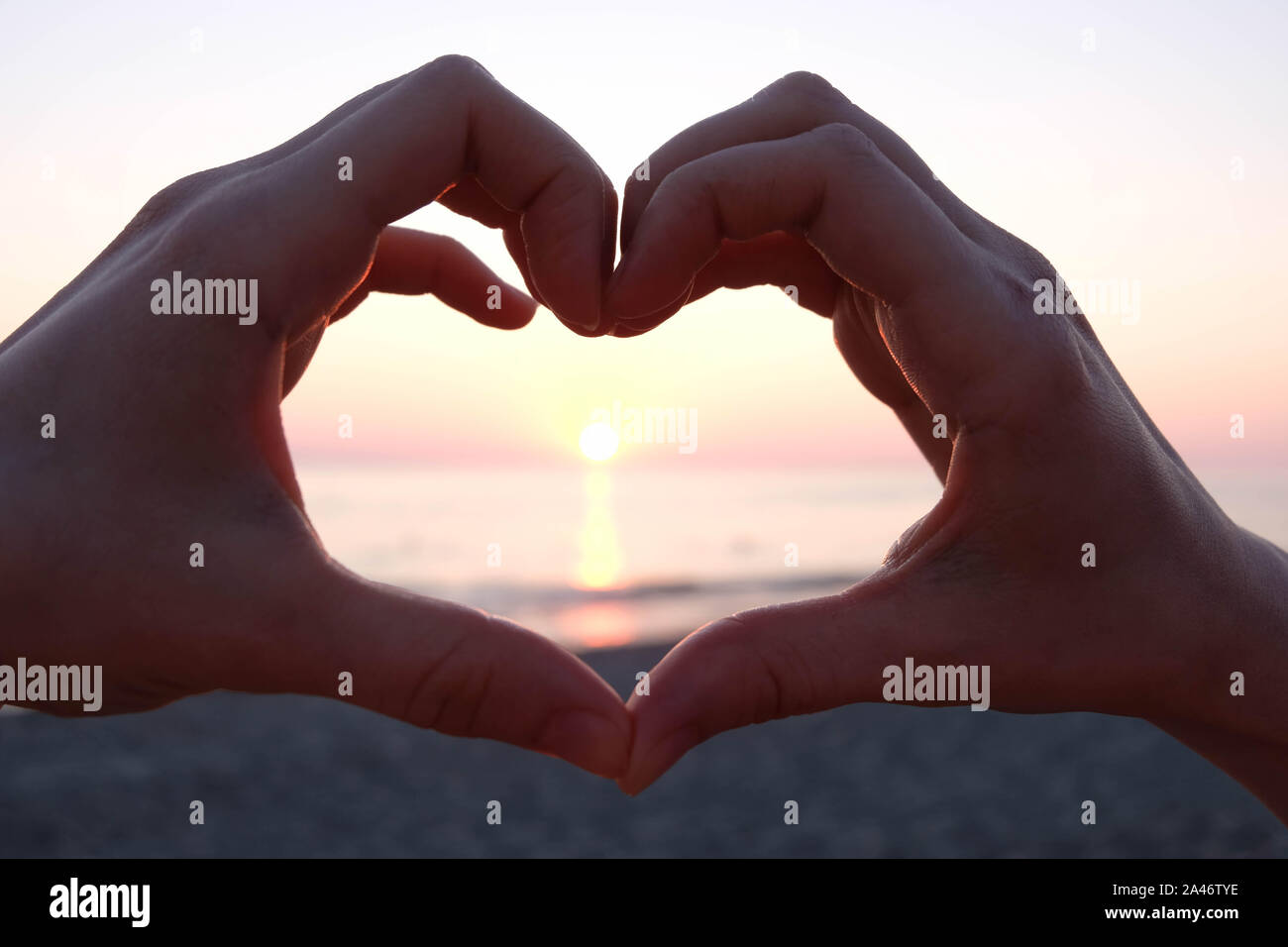 Heart shape pose beach hi-res stock photography and images - Alamy