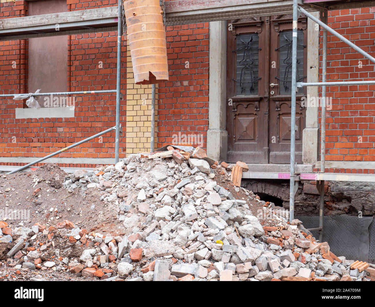 Rubble chute with debris on a construction site Stock Photo - Alamy