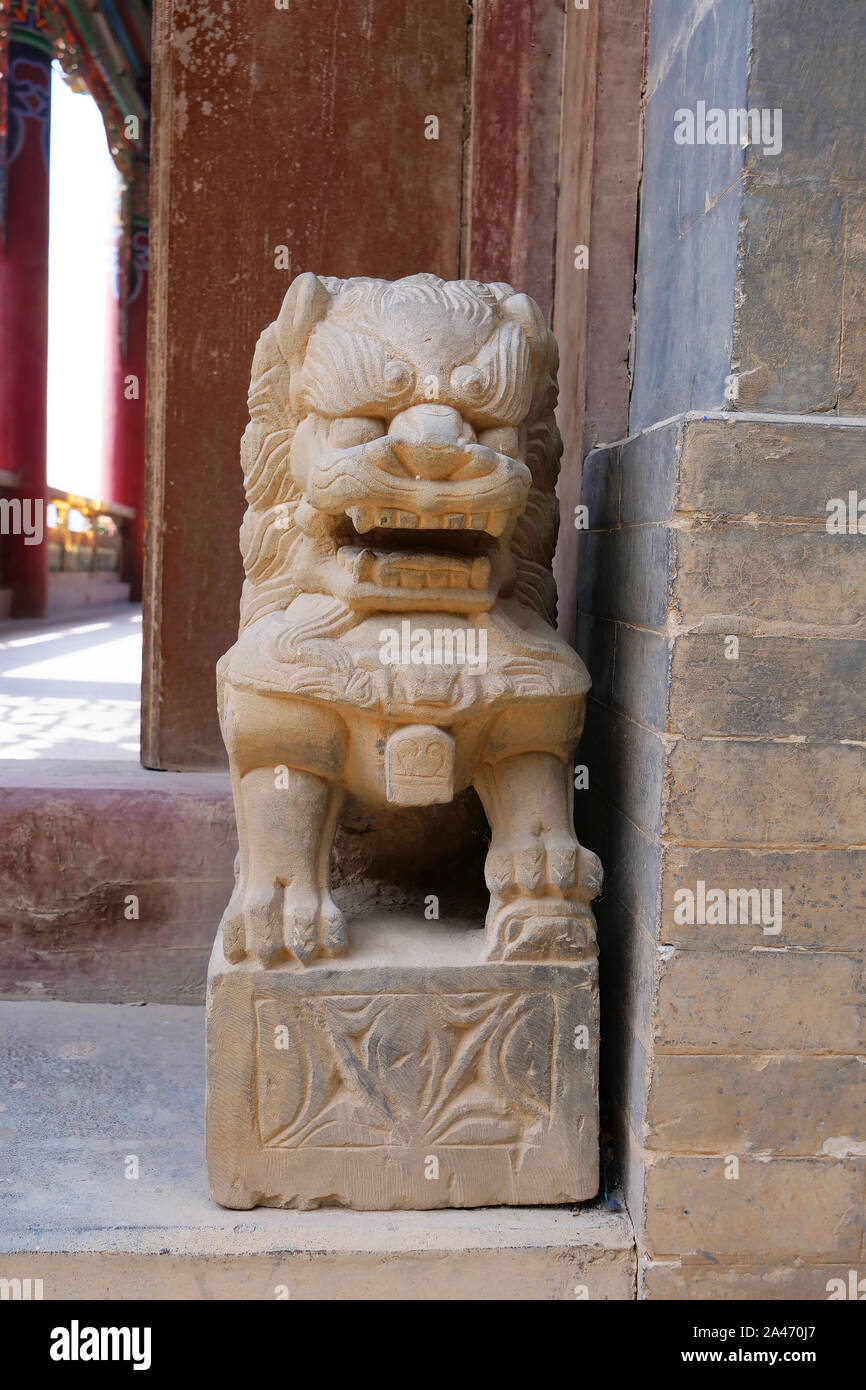 Stone rock lion statue in Tulou Temple of Beishan Mountain, Yongxing ...