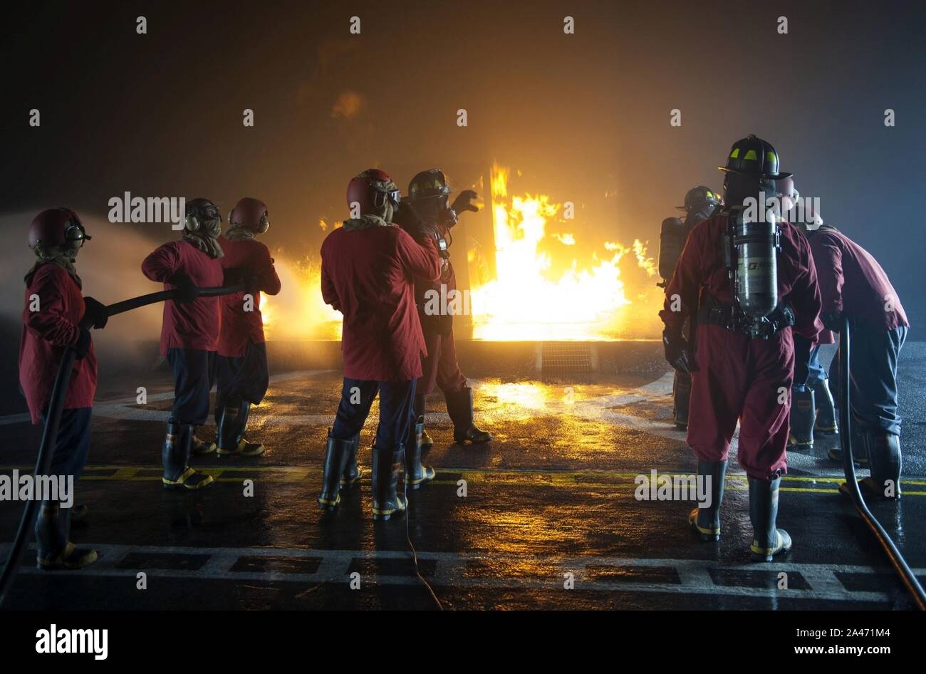 Flight deck firefighting training evolution at Joint Base Pearl Ha ...