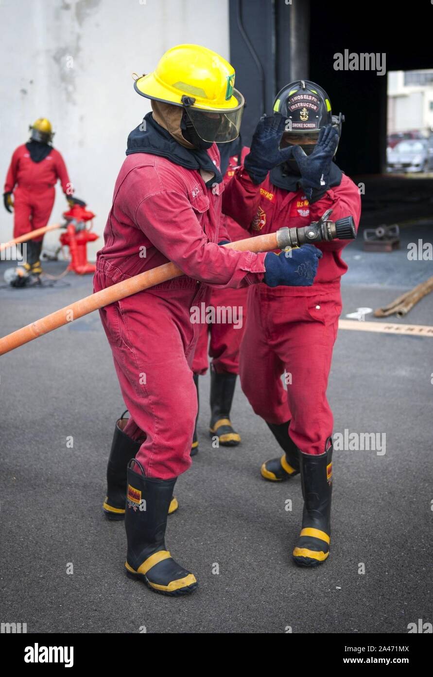 Flight deck firefighting training evolution at Joint Base Pearl Ha ...