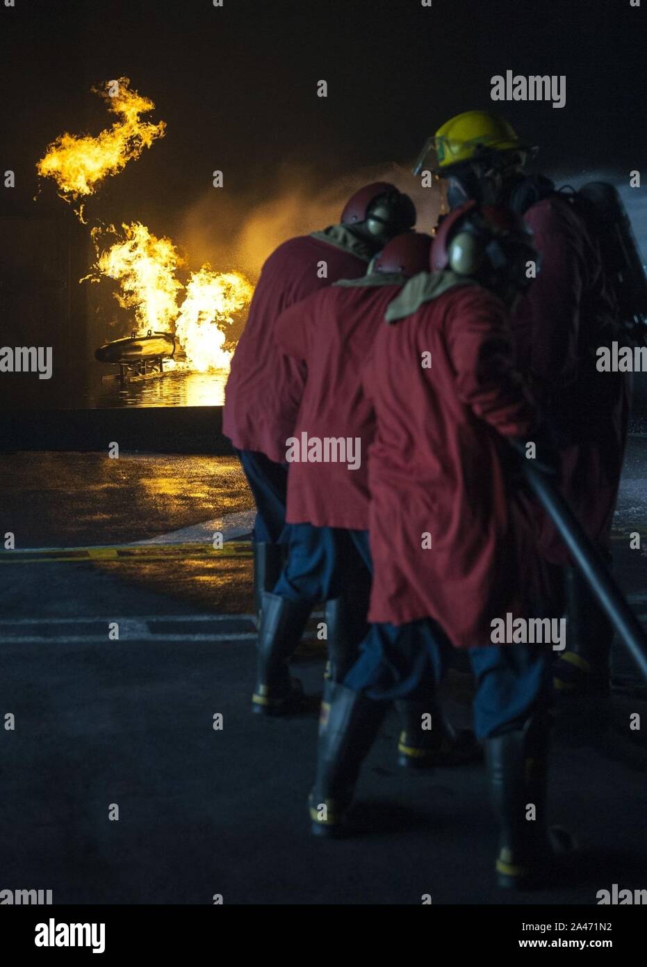 Flight deck firefighting training evolution at Joint Base Pearl Ha ...