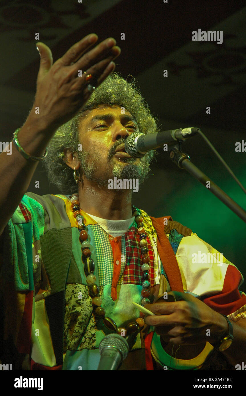 Paban Das Baul performs on a stage. He is known for pioneering ...