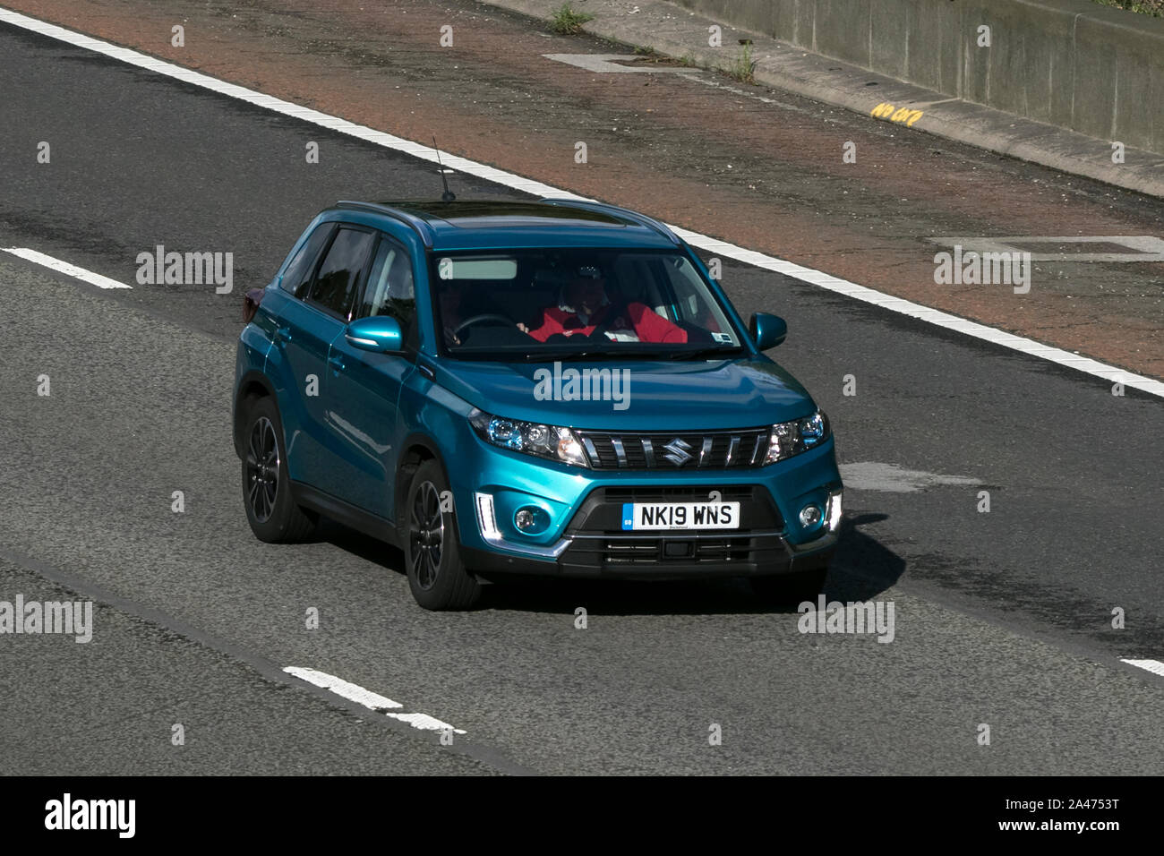 2019 Turquoise Suzuki Vitara SZ5 Boosterjet AGR; traveling on the M6 ...