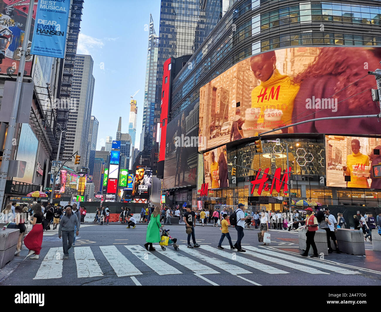 New York, USA. 08th Sep, 2019. Passers-by cross a crosswalk in Times ...