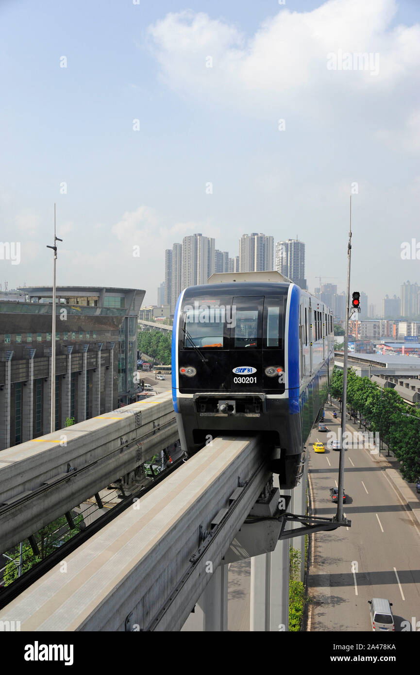 Monorail train departs from Bagongli station on Chongqing metro line 3 ...