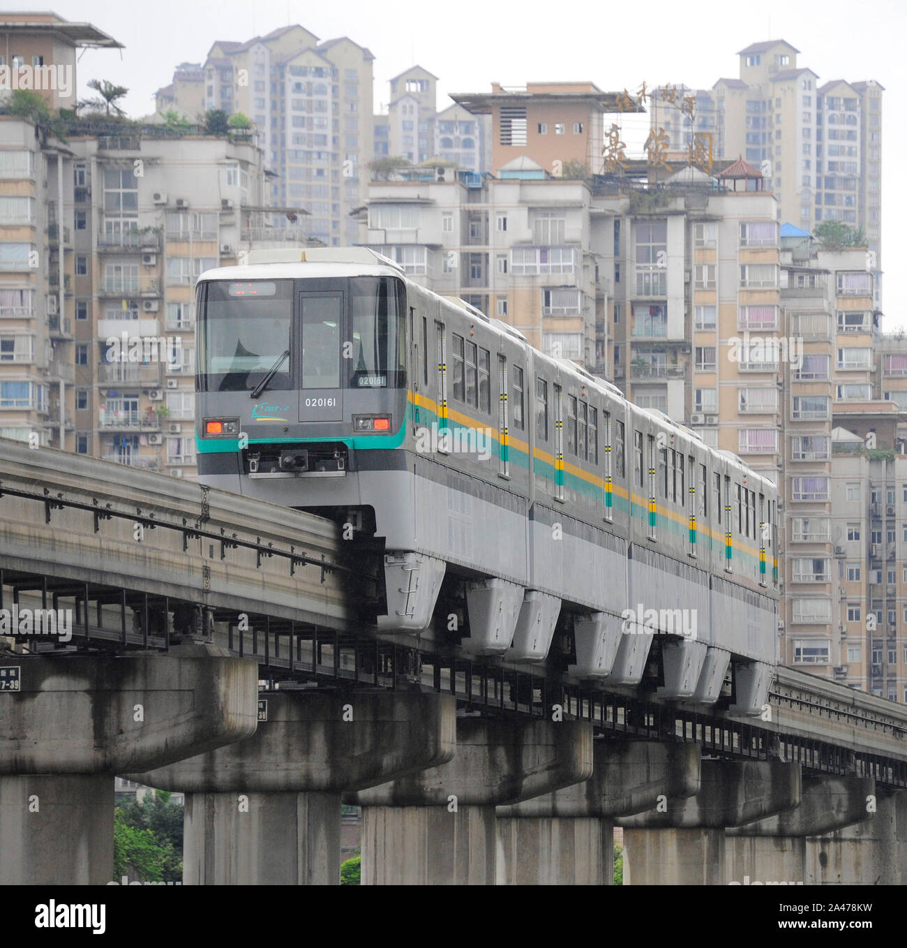 Monorail train between Xinshancun and Daxikou stations on Chongqing ...