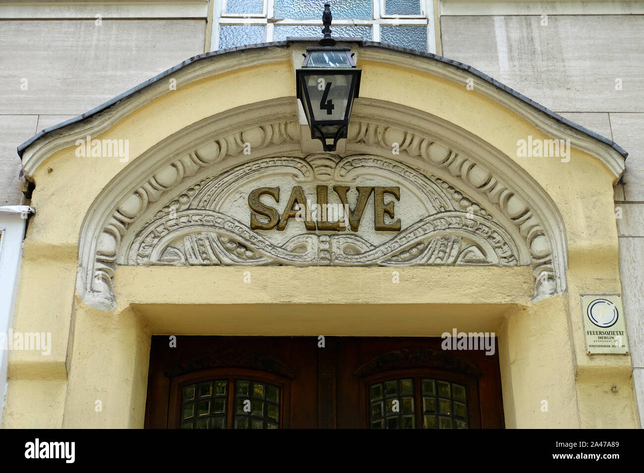 The Latin salve salute at an old building in Berlin Stock Photo - Alamy