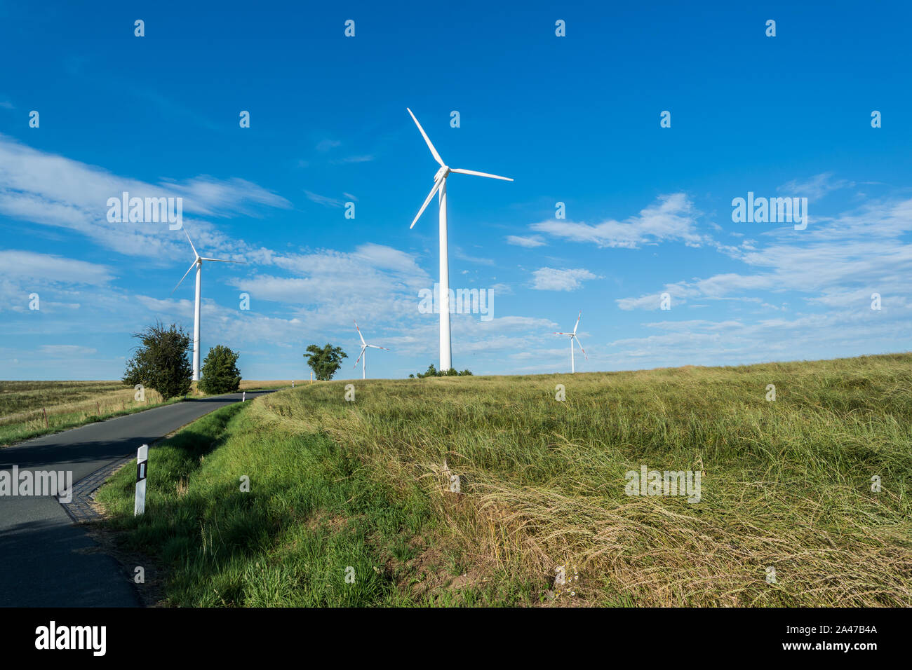 Offshore and Onshore Windmill farm Stock Photo - Alamy