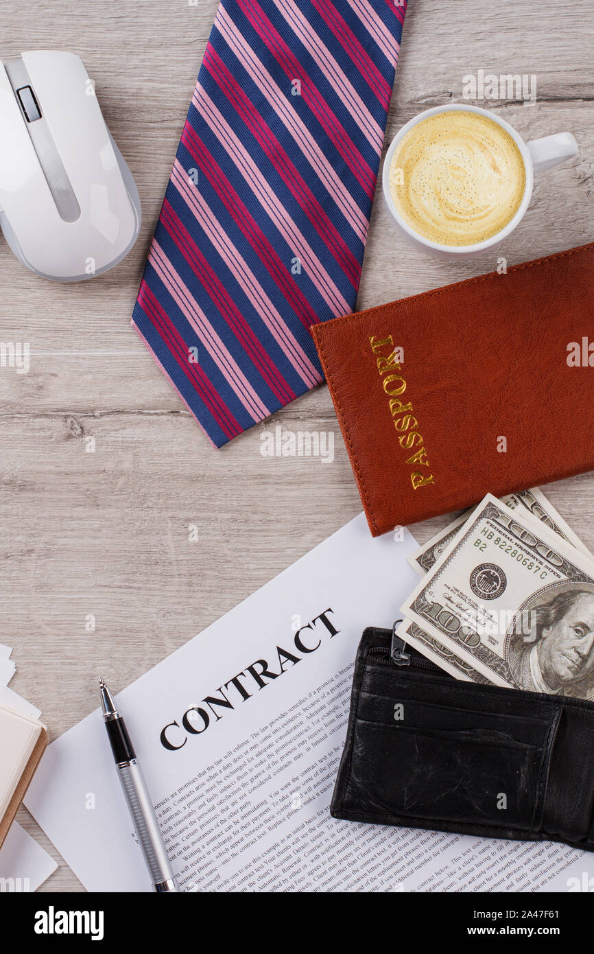 Money, passport and cappuccino Stock Photo - Alamy