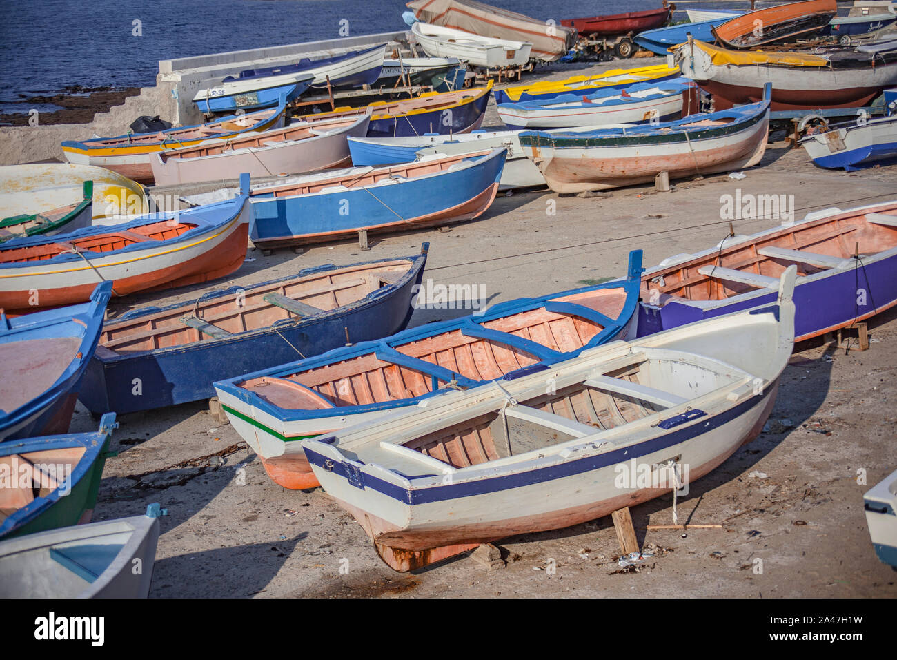 Colorful boats on the beach Stock Photo - Alamy