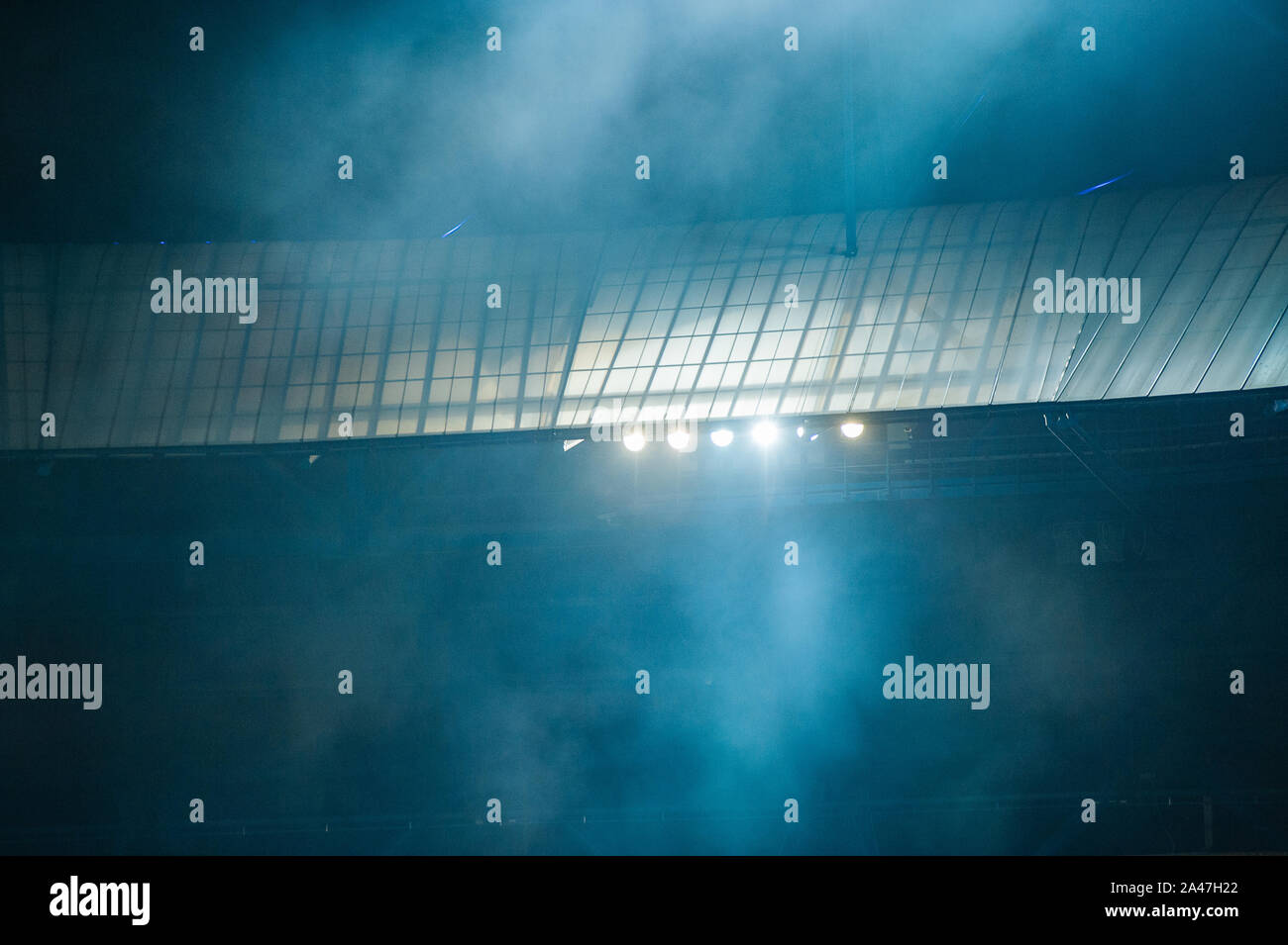 The stadium lights and smoke Stock Photo - Alamy