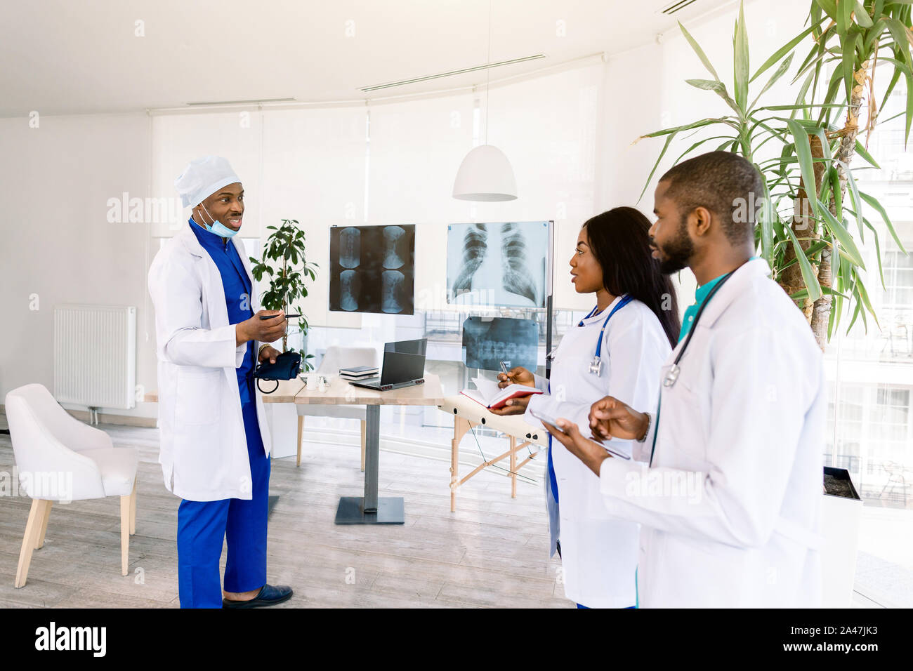 profession, people, surgery, radiology and medicine concept - group of ...