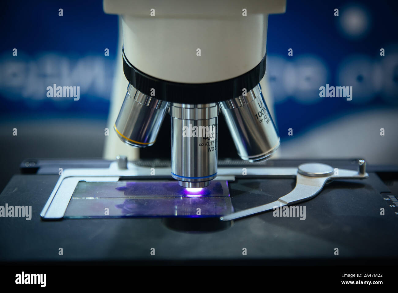 Scientific or medical test sample under light microscope in laboratory ...