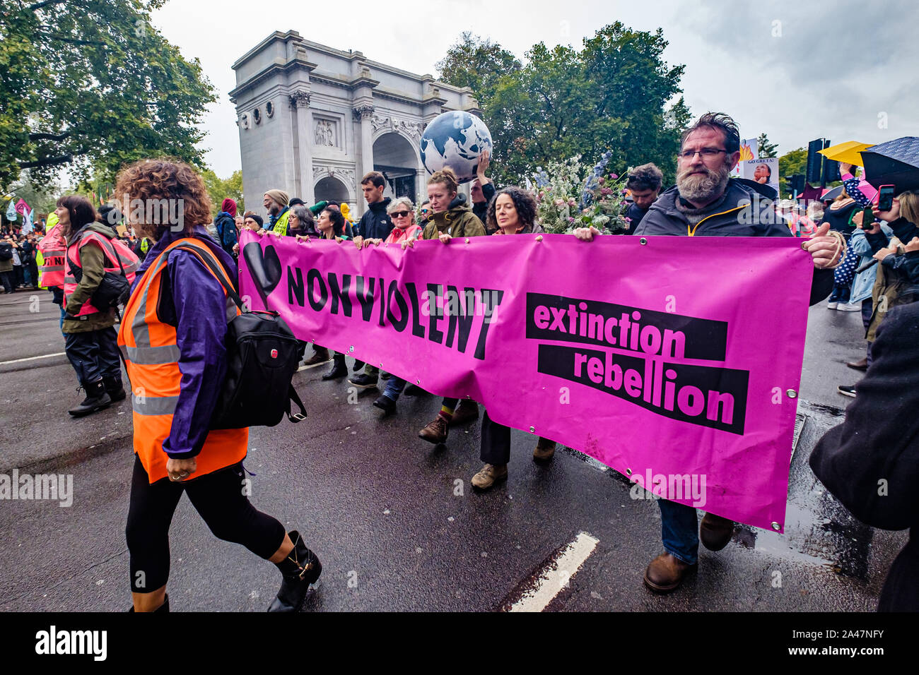 London, UK. 12th October 2019. Extinction Rebellion banner at Marble ...