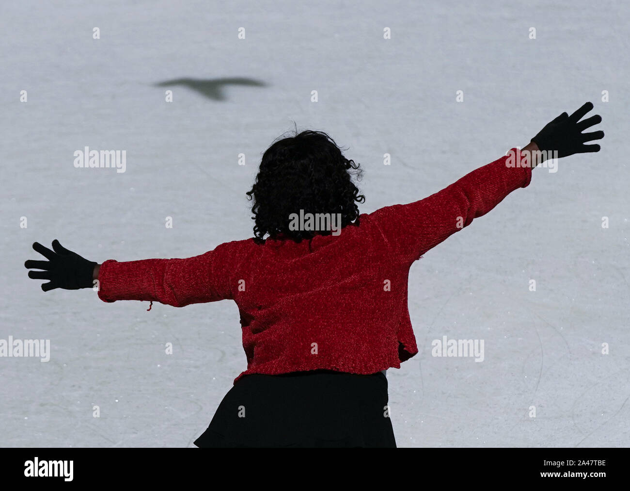New York, USA. 12th Oct, 2019. A skates spreads her arms near the ...