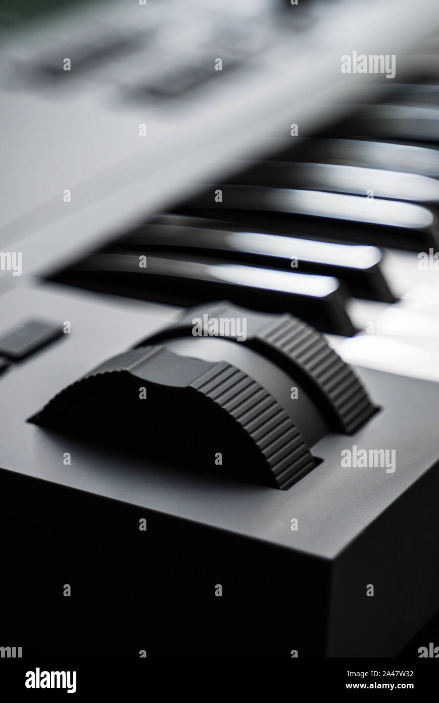 Professional midi keyboard synthesizer with knobs and controllers ...
