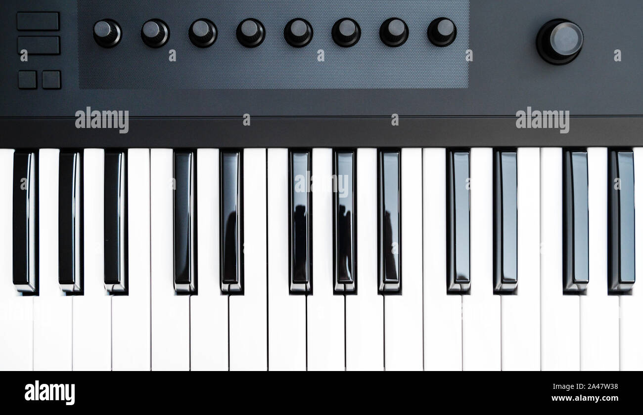 Professional midi keyboard synthesizer with knobs and controllers. Top ...