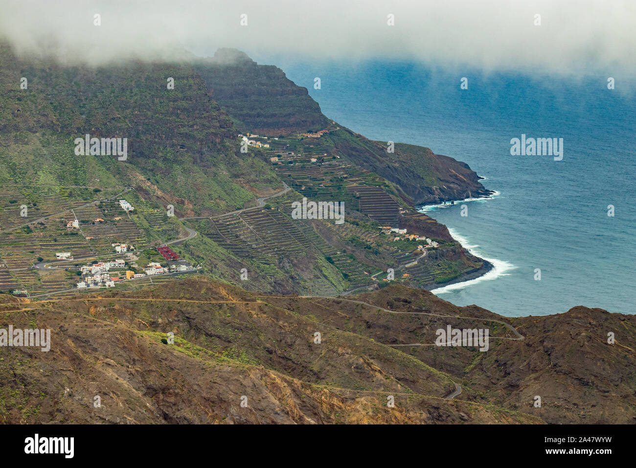 Aerial view of northeast of La Gomera Island. Beautiful rocky ocean coast with breaking waves ...