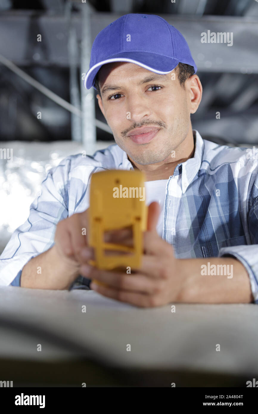 engineer tests industrial electrical circuits with a multimeter Stock ...