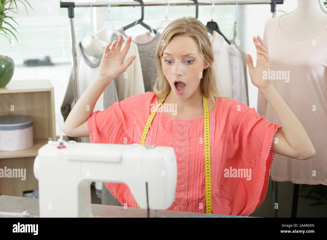 Tailor woman setting sewing machine hi-res stock photography and images ...