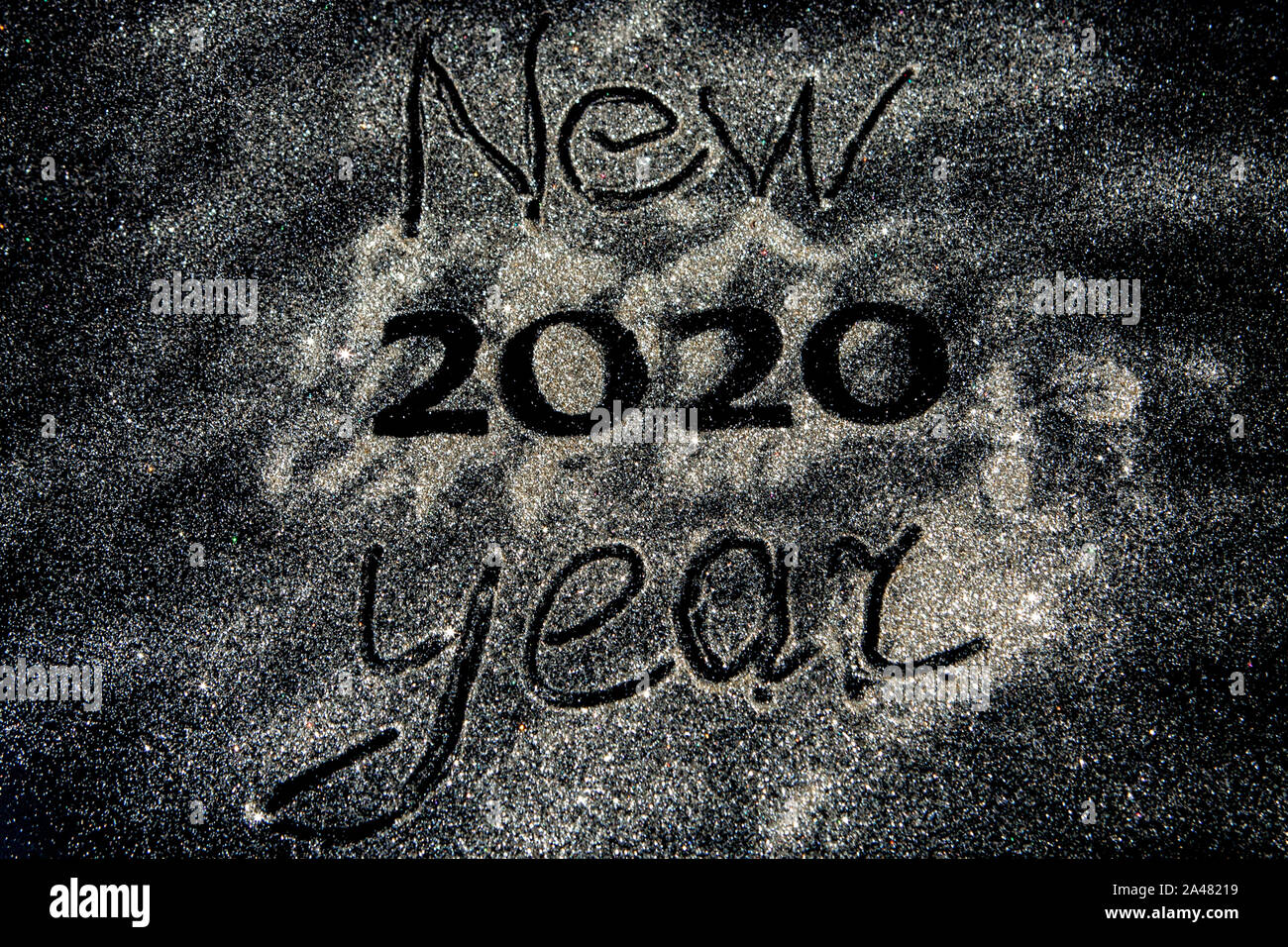 Happy New Year 2020. Beautiful sparkling Golden number 2020 on black ...