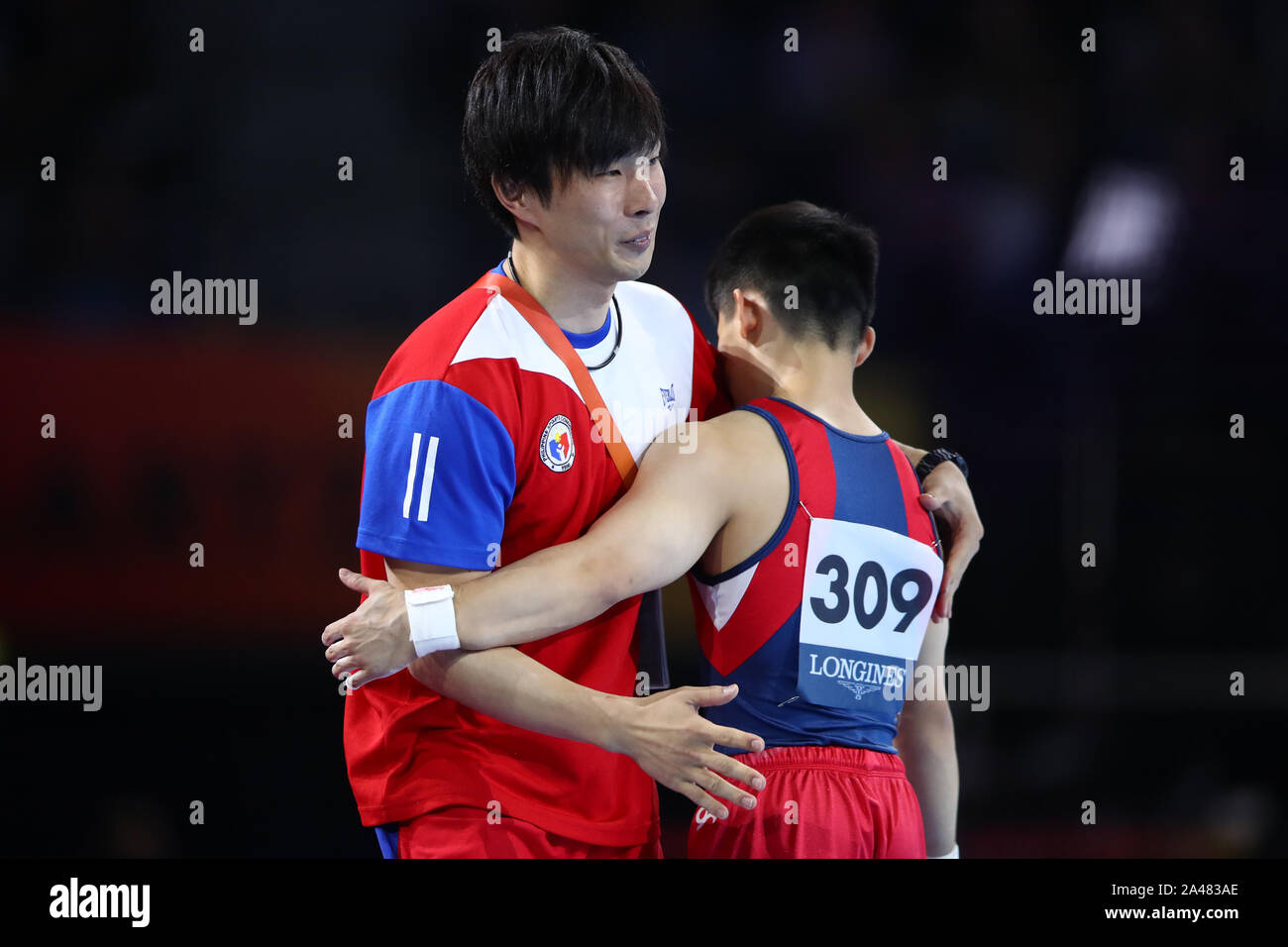 Stuttgart, Germany. 12th Oct, 2019. (L-R) Munehiro Kugimiya, Carlos Edriel Yulo (PHI) Artistic ...