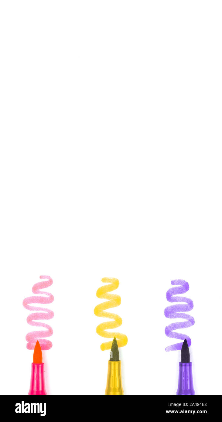 Three multicolored markers on a white background with copy space Stock ...