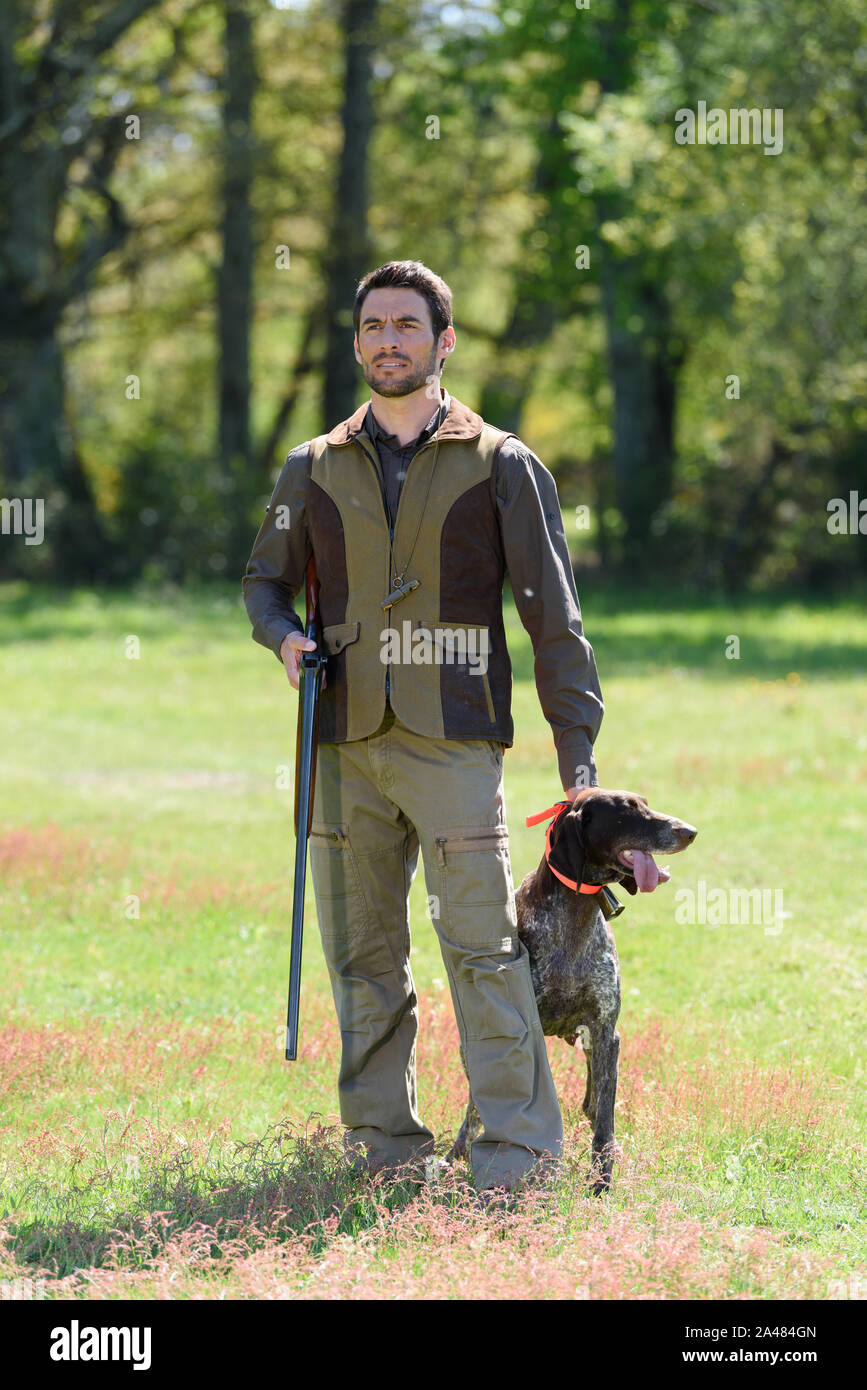 hunters with dogs hunting a bird woodcock Stock Photo - Alamy
