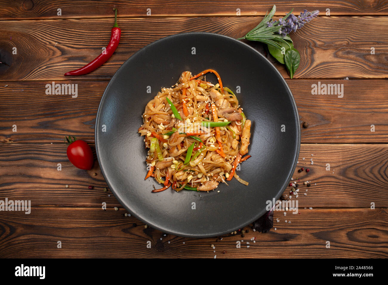 tori udon fried wheat noodles with chicken and vegetables and soy sauce ...