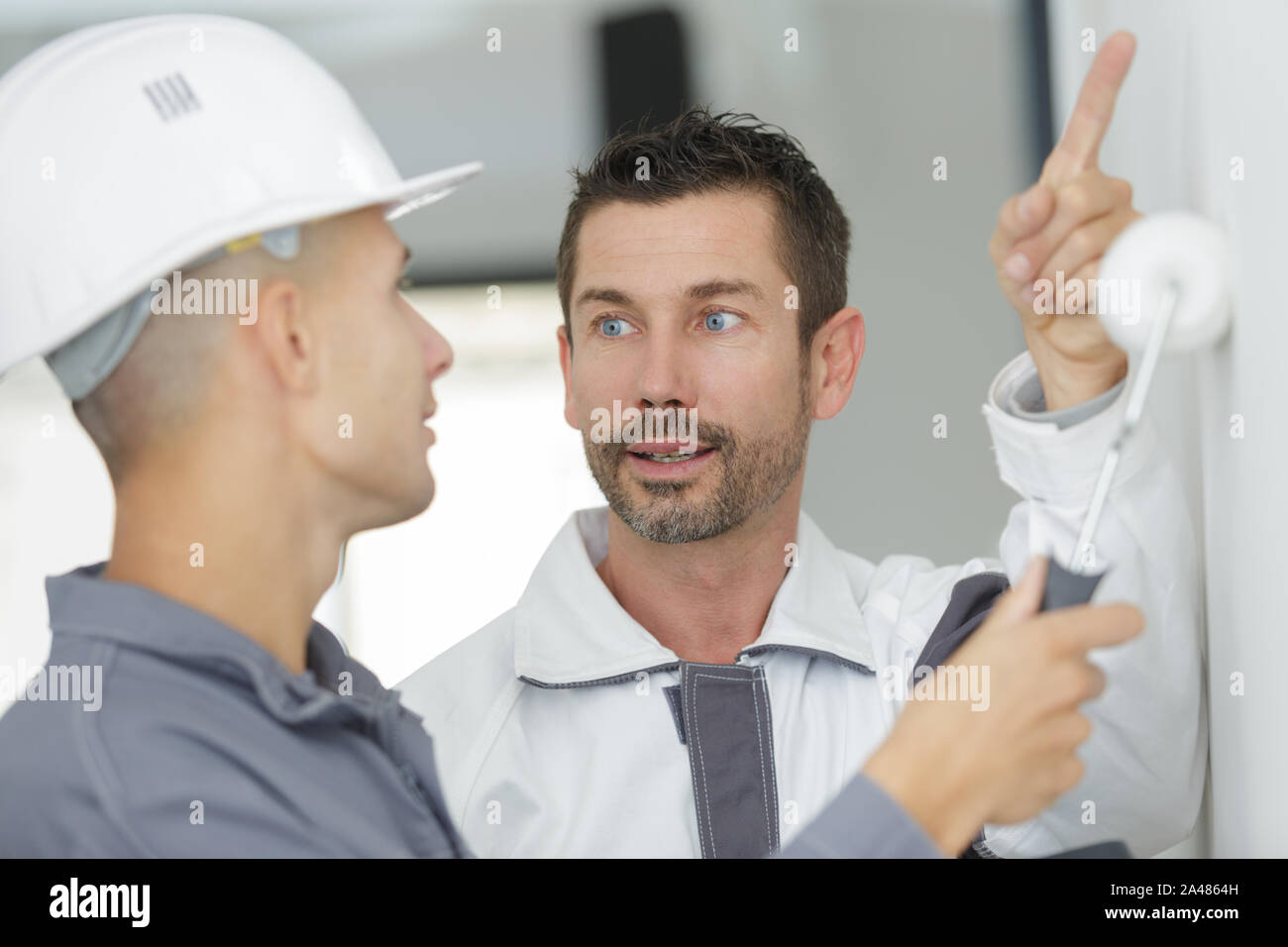 male apprentice with instructor Stock Photo - Alamy