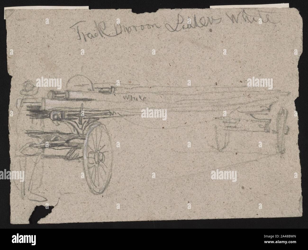 Firefighter standing next to a ladder carriage Stock Photo - Alamy