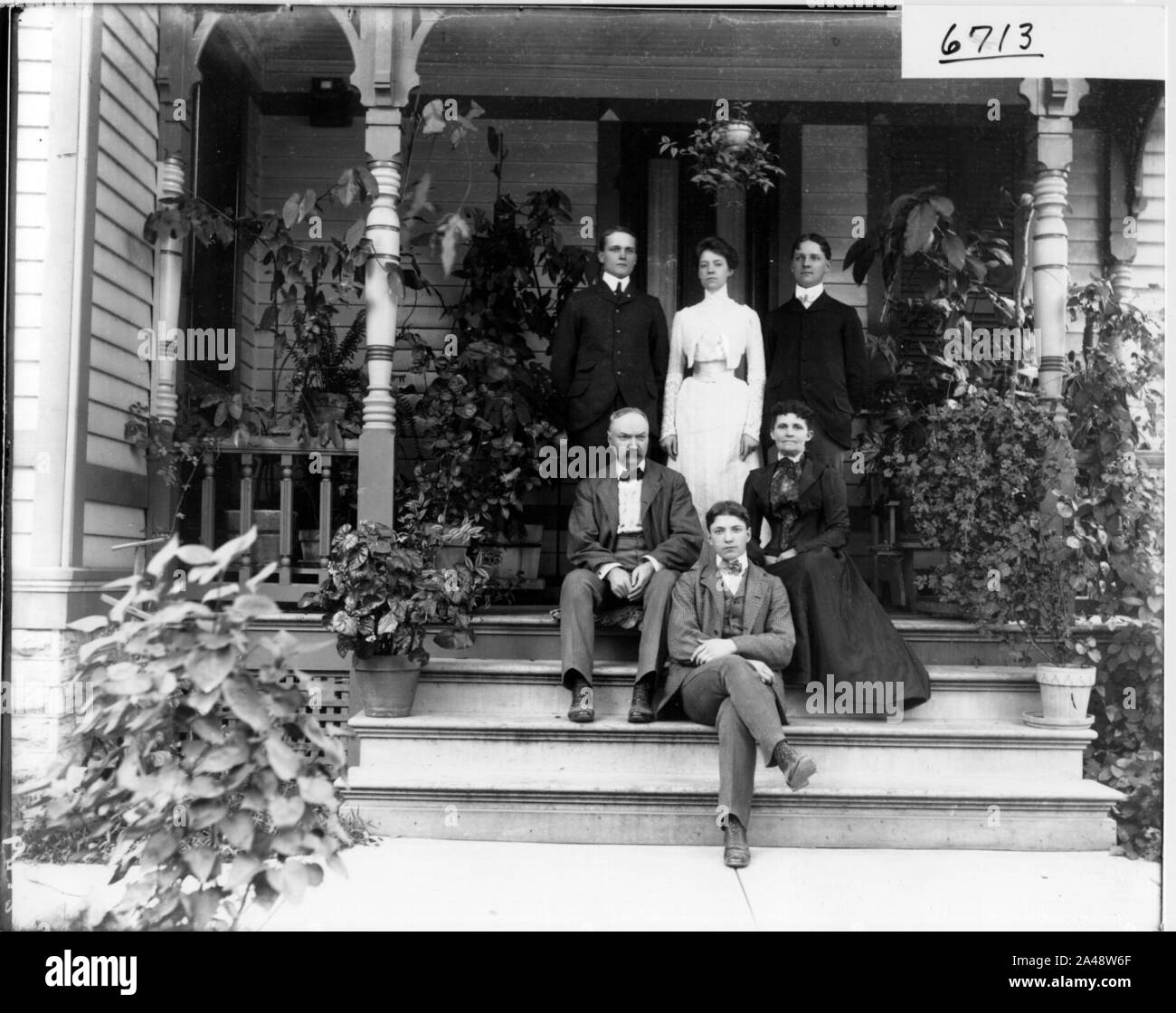 Flower family on porch ca. 1905 Stock Photo - Alamy