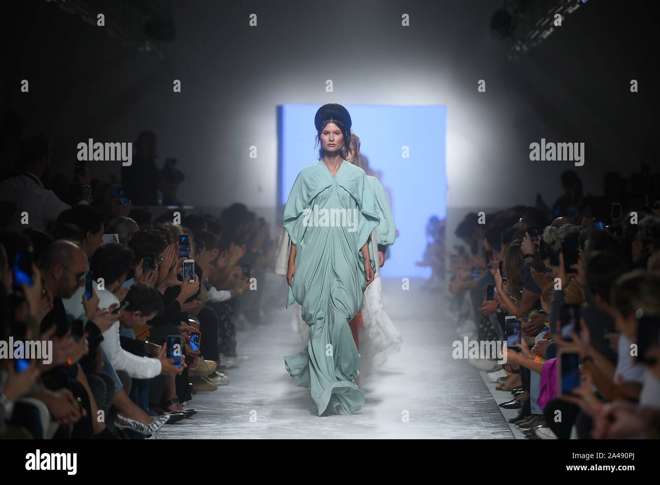 Lisboa, Portugal. 13th Oct, 2019. A model walks the runway during Dino ...