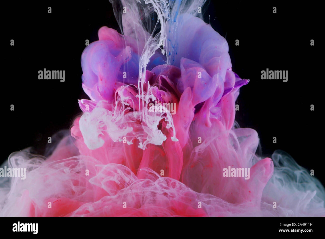 Splash of different color paints hi-res stock photography and images ...