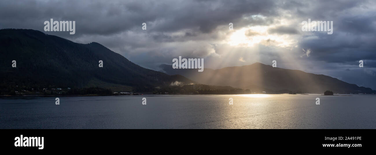 Dramatic clouds and sunlight during stormy weather over ocean hi-res ...