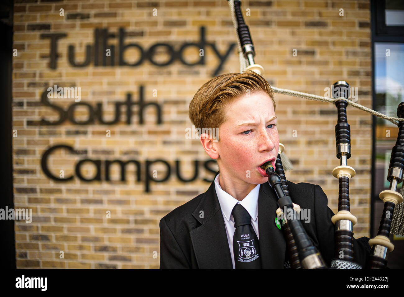 Alva Academy piper, Finley Rowe is seen playing outside of the main ...