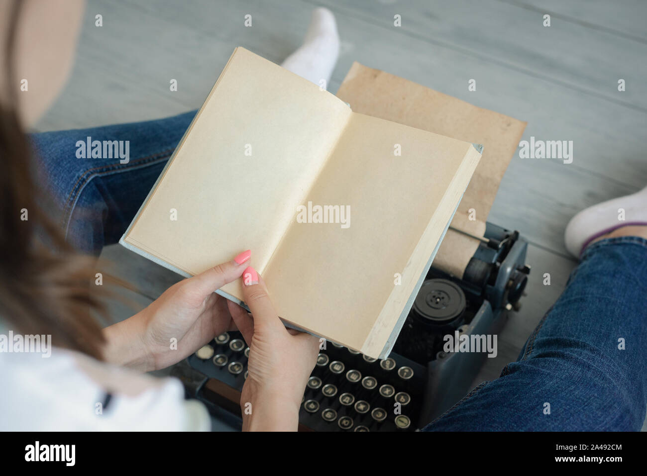 Woman is reading a blank page book with copy space. Student concept ...