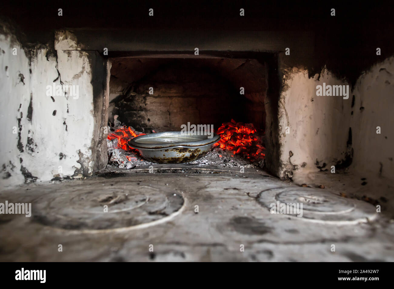 Delicious, nourishing food is prepared in the old Russian village oven ...