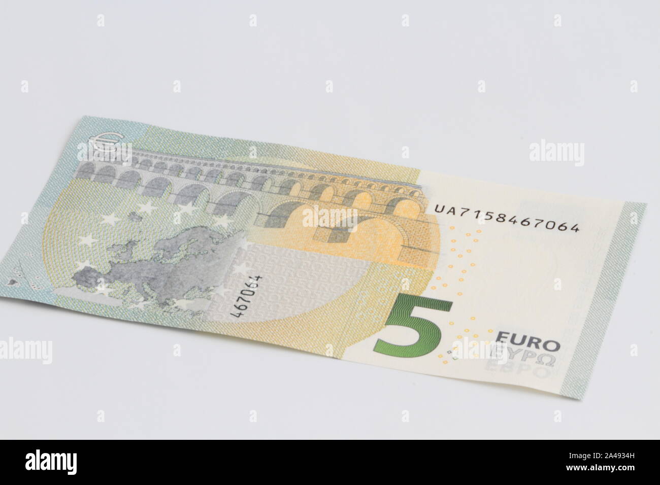5 Euro Banknotes on a table Stock Photo - Alamy