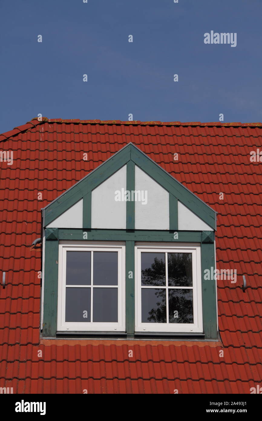 House with roof window Stock Photo - Alamy