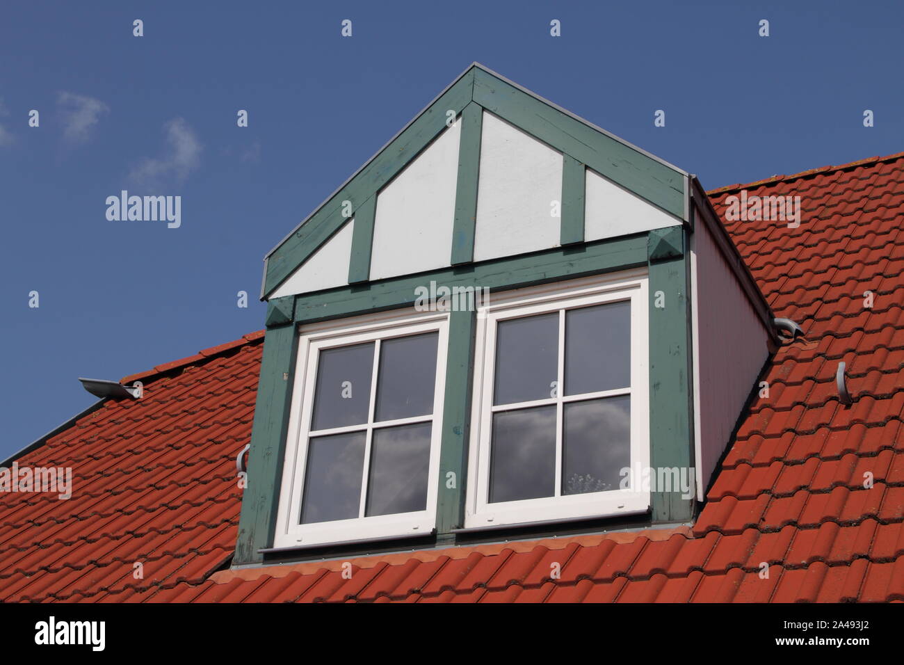 House with roof window Stock Photo - Alamy