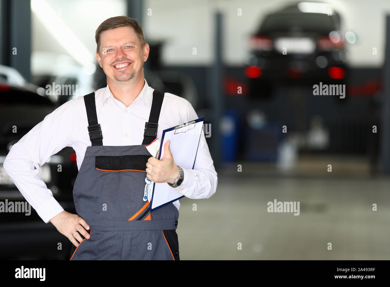 Mechanic laughing High Resolution Stock Photography and Images - Alamy