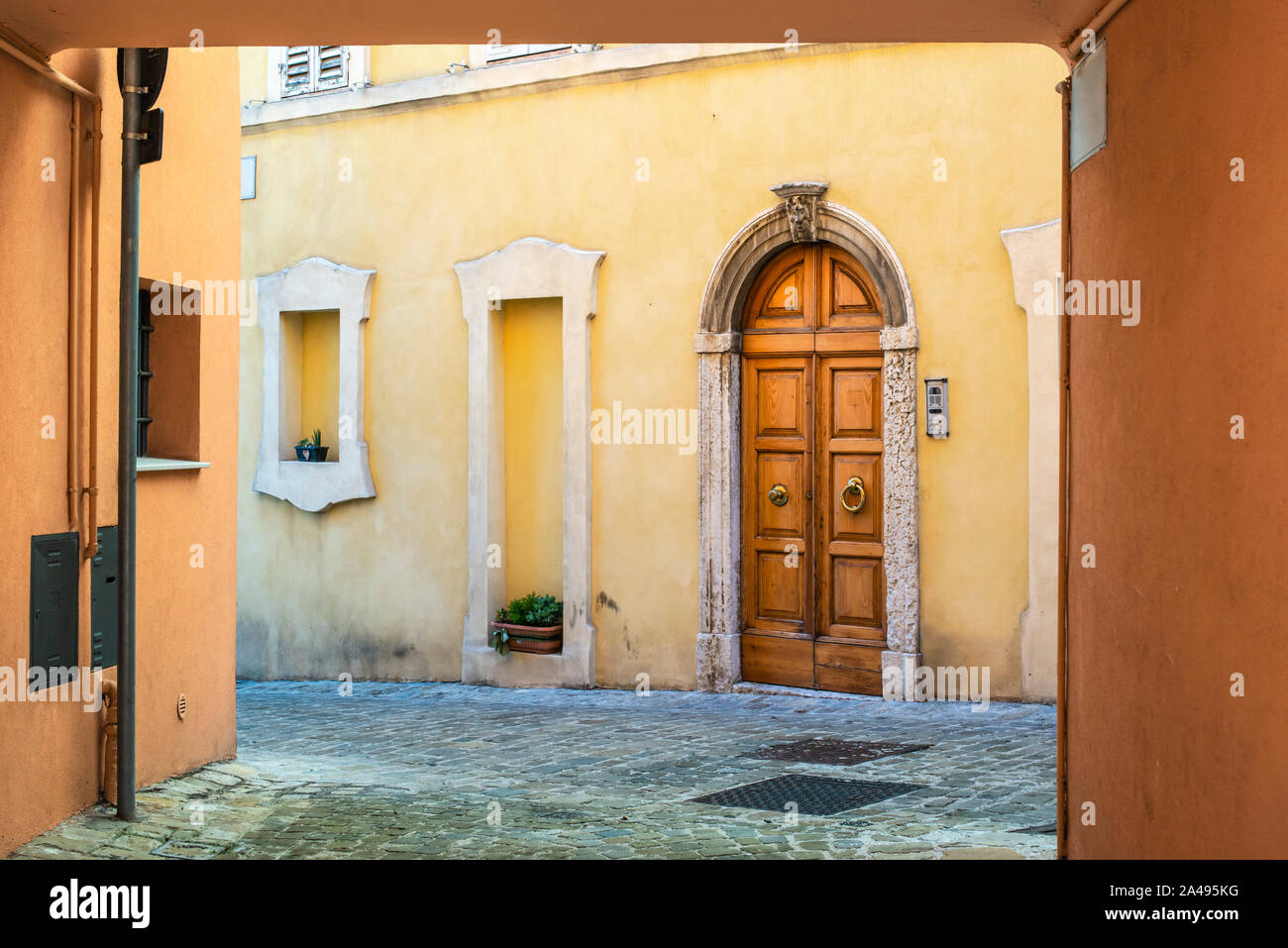 Typical italian facade with door. Italian house. Traditional style and ...